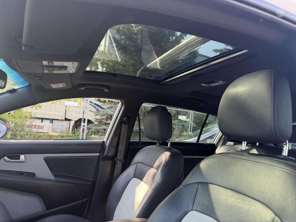 White Kia Sportage 2014 in Marijampole, with an engine capacity of 2.00 L and mileage of 241 thousand km for 5650 €, photo 7 on AUTOMOTO.COM.LV