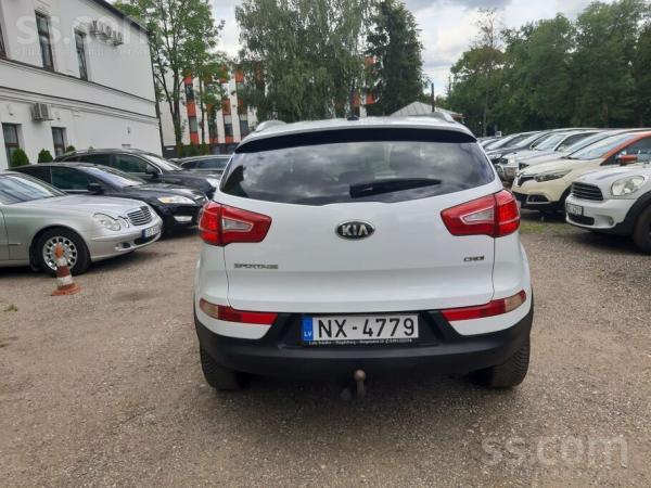 White Kia Sportage 2014 in Daugavpils, with an engine capacity of 1.70 L and mileage of 0 thousand km for 7450 €, photo 7 on AUTOMOTO.COM.LV