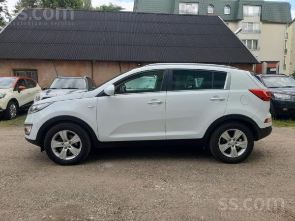 White Kia Sportage 2014 in Daugavpils, with an engine capacity of 1.70 L and mileage of 0 thousand km for 7450 €, photo 10 on AUTOMOTO.COM.LV