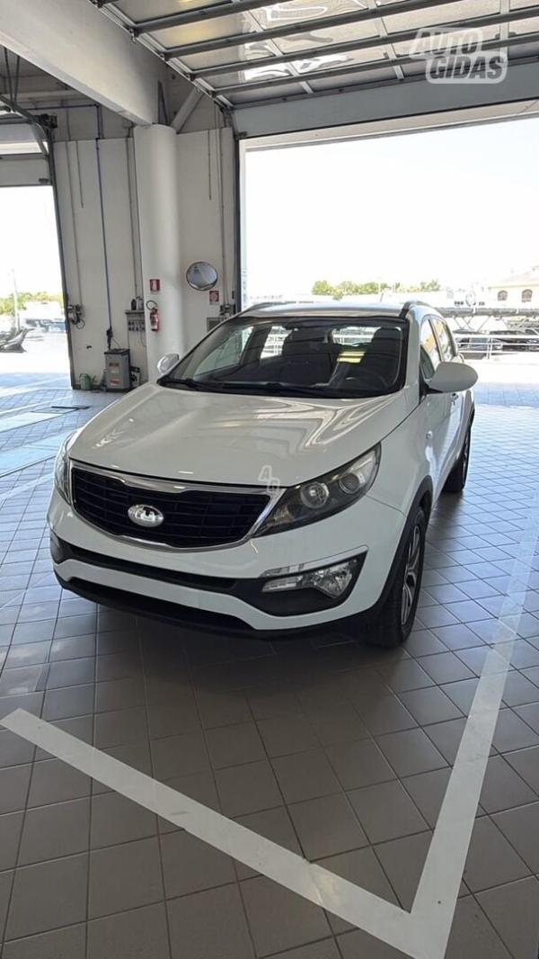 White Kia Sportage 2014 in Utena, with an engine capacity of 1.60 L and mileage of 171 thousand km for 7850 €, photo 4 on AUTOMOTO.COM.LV