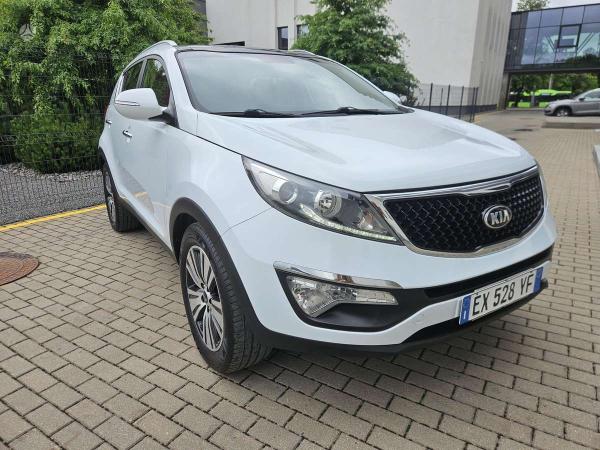 White Kia Sportage 2015 in Kaunas, with an engine capacity of 1.69 L and mileage of 250 thousand km for 6750 €, photo 7 on AUTOMOTO.COM.LV