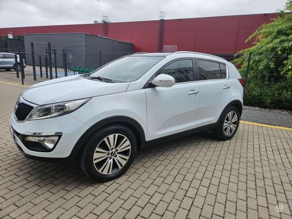 White Kia Sportage 2015 in Kaunas, with an engine capacity of 1.69 L and mileage of 250 thousand km for 6750 €, photo 8 on AUTOMOTO.COM.LV