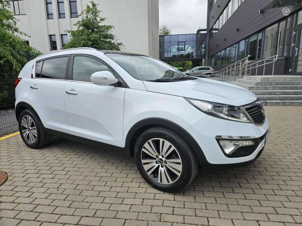 White Kia Sportage 2015 in Kaunas, with an engine capacity of 1.69 L and mileage of 250 thousand km for 6750 €, photo 9 on AUTOMOTO.COM.LV