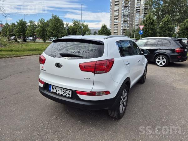 Белый Киа Sportage 2015 в Рига, объемом двигателя 1.70 л и пробегом 277 тыс. км за 7490 €, фото 6 на AUTOMOTO.COM.LV
