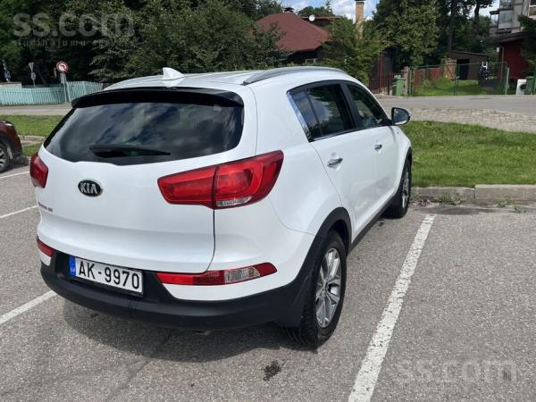 White Kia Sportage 2015 in Riga, with an engine capacity of 2.00 L and mileage of 125 thousand km for 8500 €, photo 8 on AUTOMOTO.COM.LV