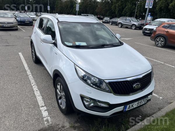 White Kia Sportage 2015 in Riga, with an engine capacity of 2.00 L and mileage of 125 thousand km for 9100 €, photo 5 on AUTOMOTO.COM.LV