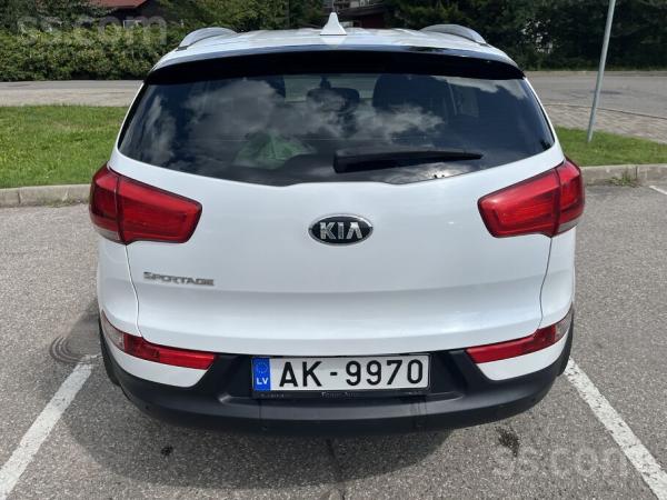 White Kia Sportage 2015 in Riga, with an engine capacity of 2.00 L and mileage of 125 thousand km for 9100 €, photo 9 on AUTOMOTO.COM.LV