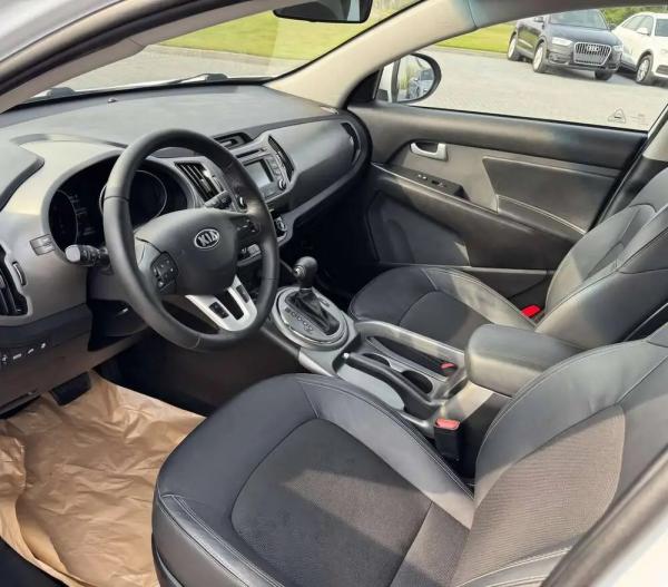 Белый Киа Sportage 2015 в Тельшяй, объемом двигателя 2.00 л и пробегом 94 тыс. км за 9290 €, фото 10 на AUTOMOTO.COM.LV