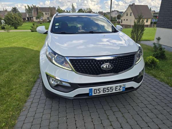 White Kia Sportage 2015 in Rokiskis, with an engine capacity of 1.69 L and mileage of 300 thousand km for 6200 €, photo 4 on AUTOMOTO.COM.LV