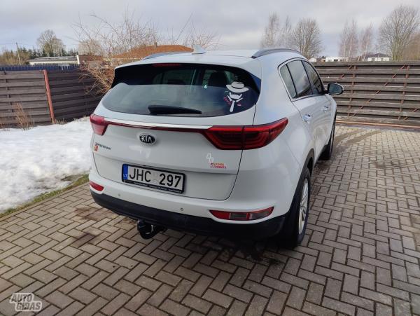 White Kia Sportage 2016 in Kaunas, with an engine capacity of 1.60 L and mileage of 185 thousand km for 11000 €, photo 5 on AUTOMOTO.COM.LV