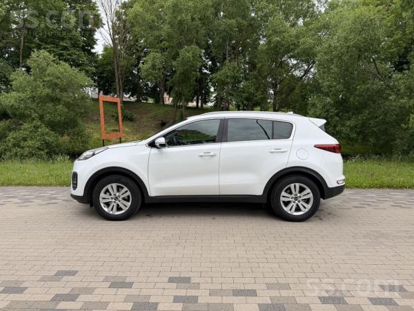 White Kia Sportage 2016 in Rezekne, with an engine capacity of 1.70 L and mileage of 230 thousand km for 8990 €, photo 4 on AUTOMOTO.COM.LV