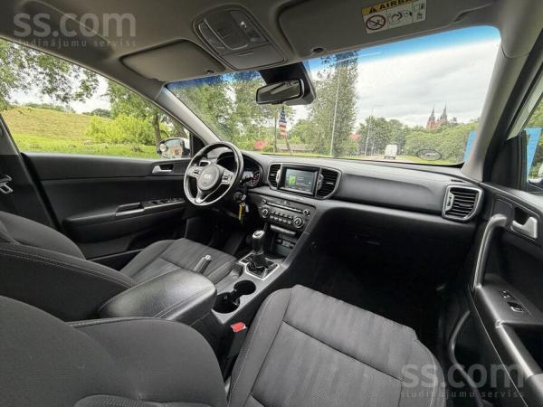 White Kia Sportage 2016 in Rezekne, with an engine capacity of 1.70 L and mileage of 230 thousand km for 8990 €, photo 9 on AUTOMOTO.COM.LV