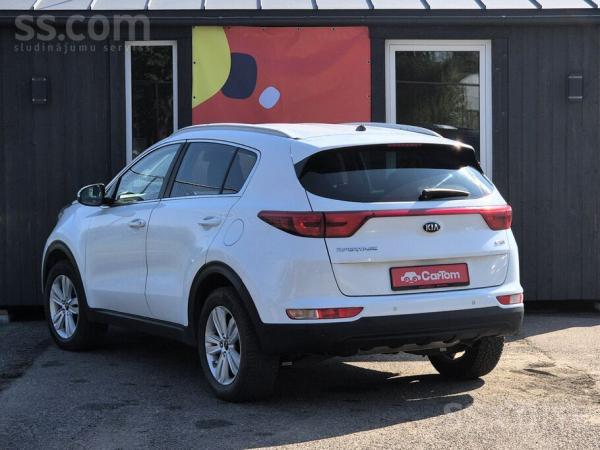 White Kia Sportage 2016 in Riga, with an engine capacity of 1.70 L and mileage of 213 thousand km for 8190 €, photo 4 on AUTOMOTO.COM.LV