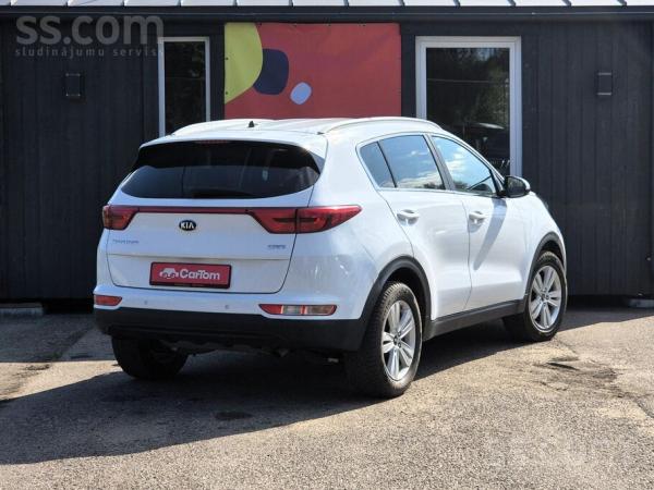 White Kia Sportage 2016 in Riga, with an engine capacity of 1.70 L and mileage of 213 thousand km for 8190 €, photo 6 on AUTOMOTO.COM.LV