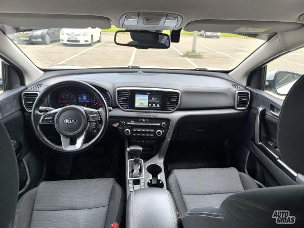White Kia Sportage 2019 in Siauliai, with an engine capacity of 1.60 L and mileage of 274 thousand km for 11900 €, photo 4 on AUTOMOTO.COM.LV
