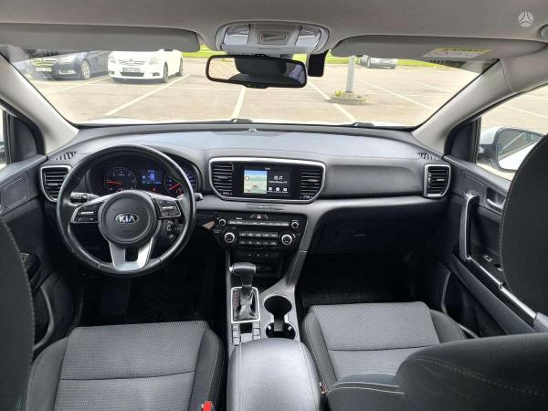 White Kia Sportage 2019 in Siauliai, with an engine capacity of 1.60 L and mileage of 274 thousand km for 11900 €, photo 4 on AUTOMOTO.COM.LV