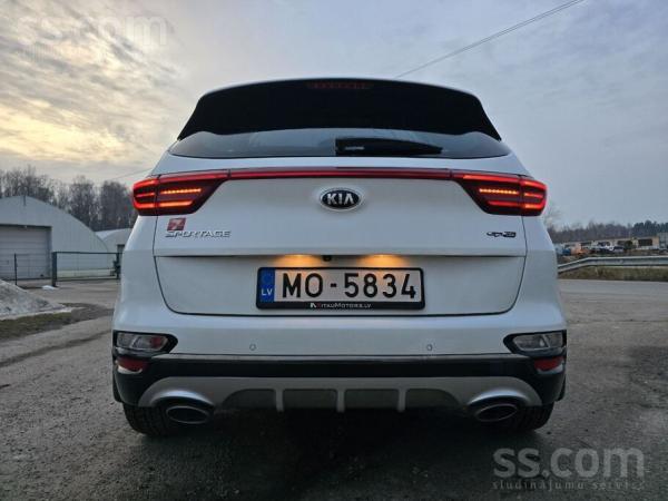 White Kia Sportage 2020 in Riga, with an engine capacity of 1.60 L and mileage of 92 thousand km for 17200 €, photo 3 on AUTOMOTO.COM.LV