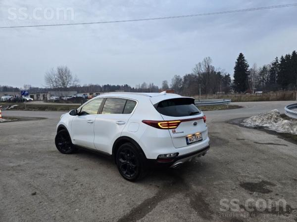 White Kia Sportage 2020 in Riga, with an engine capacity of 1.60 L and mileage of 92 thousand km for 17200 €, photo 6 on AUTOMOTO.COM.LV