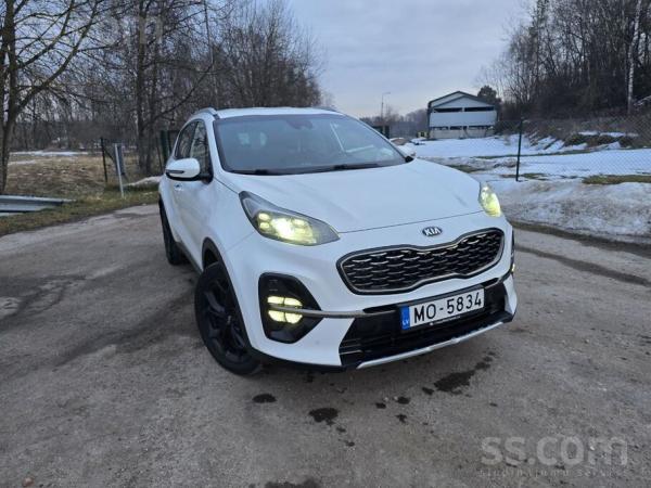 White Kia Sportage 2020 in Riga, with an engine capacity of 1.60 L and mileage of 92 thousand km for 17200 €, photo 8 on AUTOMOTO.COM.LV