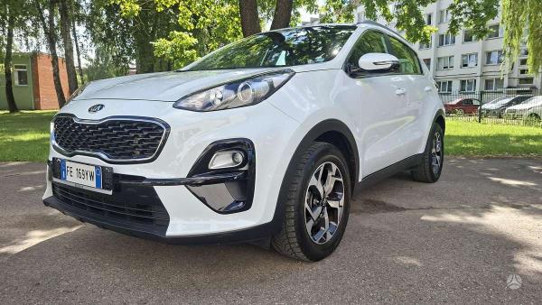 White Kia Sportage 2020 in Kaunas, with an engine capacity of 1.60 L and mileage of 66 thousand km for 13999 €, photo 1 on AUTOMOTO.COM.LV