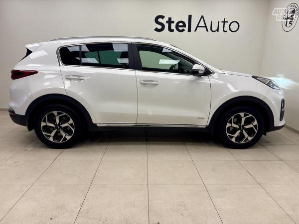 White Kia Sportage 2021 in Vilnius, with an engine capacity of 1.60 L and mileage of 75 thousand km for 17600 €, photo 6 on AUTOMOTO.COM.LV