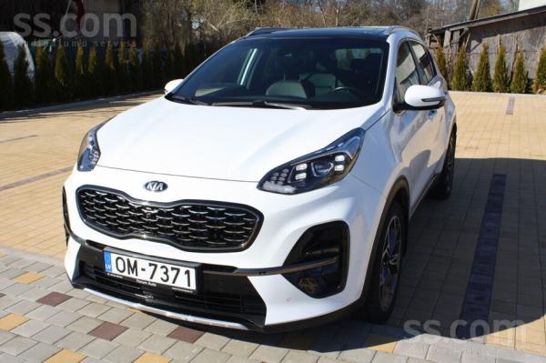 White Kia Sportage 2021 in Riga, with an engine capacity of 1.60 L and mileage of 73 thousand km for 18900 €, photo 2 on AUTOMOTO.COM.LV