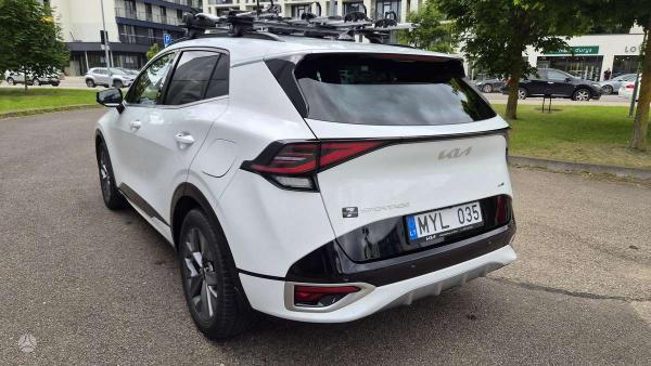 White Kia Sportage 2022 in Vilnius, with an engine capacity of 1.60 L and mileage of 67 thousand km for 25900 €, photo 5 on AUTOMOTO.COM.LV