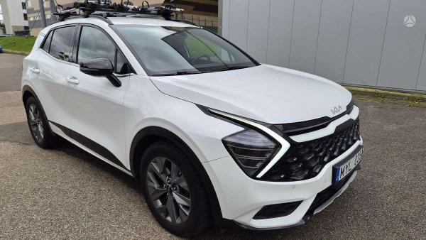 White Kia Sportage 2022 in Vilnius, with an engine capacity of 1.60 L and mileage of 67 thousand km for 25900 €, photo 8 on AUTOMOTO.COM.LV