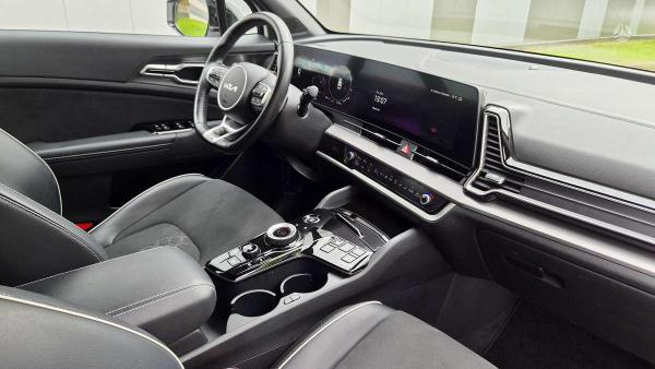 White Kia Sportage 2022 in Vilnius, with an engine capacity of 1.60 L and mileage of 67 thousand km for 25900 €, photo 10 on AUTOMOTO.COM.LV