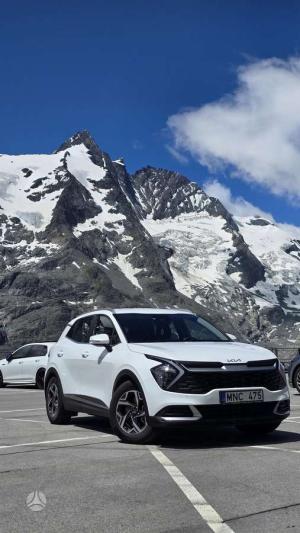 White Kia Sportage 2023 in Vilnius, with an engine capacity of 1.60 L and mileage of 73 thousand km for 20000 €, photo  on AUTOMOTO.COM.LV
