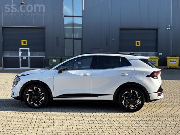 White Kia Sportage 2023 in Riga, with an engine capacity of 1.60 L and mileage of 25 thousand km for 29930 €, photo 5 on AUTOMOTO.COM.LV