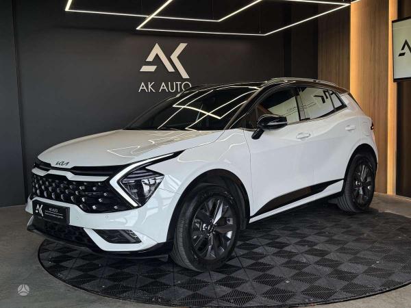 White Kia Sportage 2023 in Kaunas, with an engine capacity of 1.60 L and mileage of 68 thousand km for 31990 €, photo 6 on AUTOMOTO.COM.LV