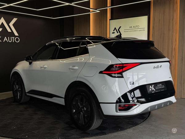 White Kia Sportage 2023 in Kaunas, with an engine capacity of 1.60 L and mileage of 68 thousand km for 31990 €, photo 8 on AUTOMOTO.COM.LV