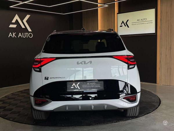 White Kia Sportage 2023 in Kaunas, with an engine capacity of 1.60 L and mileage of 68 thousand km for 31990 €, photo 10 on AUTOMOTO.COM.LV