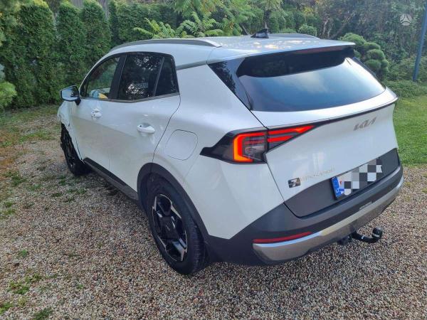 Kia Sportage 2025 in Alytus on AUTOMOTO.COM.LV White Kia Sportage 2025 in Alytus, with an engine capacity of 1.60 L and mileage of 24 thousand km for 19500 €, photo 5 on AUTOMOTO.COM.LV