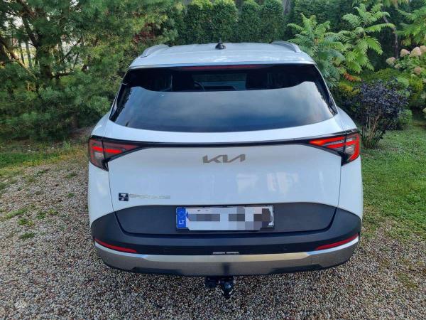 Kia Sportage 2025 in Alytus on AUTOMOTO.COM.LV White Kia Sportage 2025 in Alytus, with an engine capacity of 1.60 L and mileage of 24 thousand km for 19500 €, photo 6 on AUTOMOTO.COM.LV