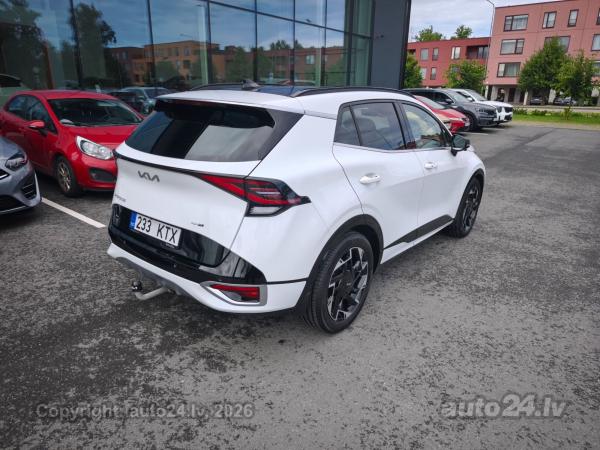 White Kia Sportage 2024 in Tallinn, with an engine capacity of 1.60 L and mileage of 32 thousand km for 34800 €, photo 6 on AUTOMOTO.COM.LV
