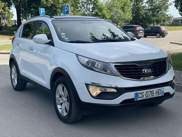 Белый Киа Sportage 2013 в Таураге, объемом двигателя 2.00 л и пробегом 250 тыс. км за 5700 €, фото 2 на AUTOMOTO.COM.LV