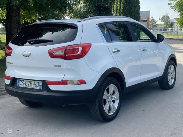 Белый Киа Sportage 2013 в Таураге, объемом двигателя 2.00 л и пробегом 250 тыс. км за 5700 €, фото 4 на AUTOMOTO.COM.LV