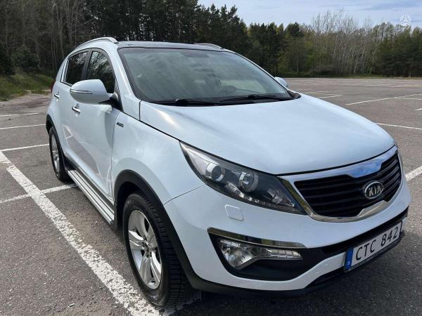 White Kia Sportage 2015 in Klaipeda, with an engine capacity of 1.70 L and mileage of 60 thousand km for 7500 €, photo 1 on AUTOMOTO.COM.LV