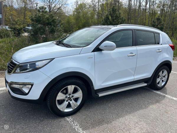 White Kia Sportage 2015 in Klaipeda, with an engine capacity of 1.70 L and mileage of 60 thousand km for 7500 €, photo 2 on AUTOMOTO.COM.LV