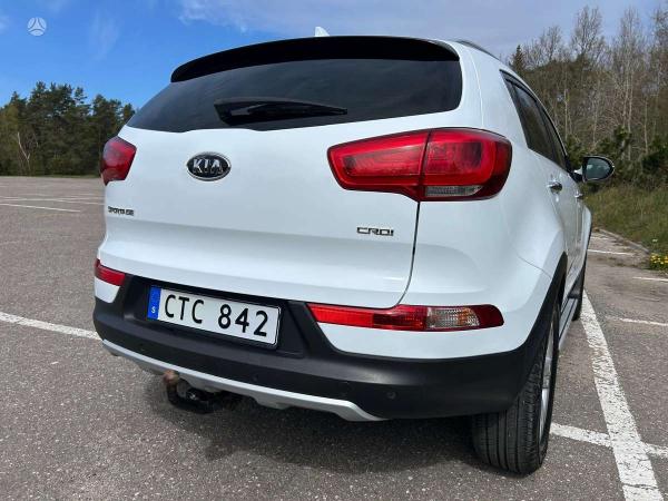 White Kia Sportage 2015 in Klaipeda, with an engine capacity of 1.70 L and mileage of 60 thousand km for 7500 €, photo 8 on AUTOMOTO.COM.LV