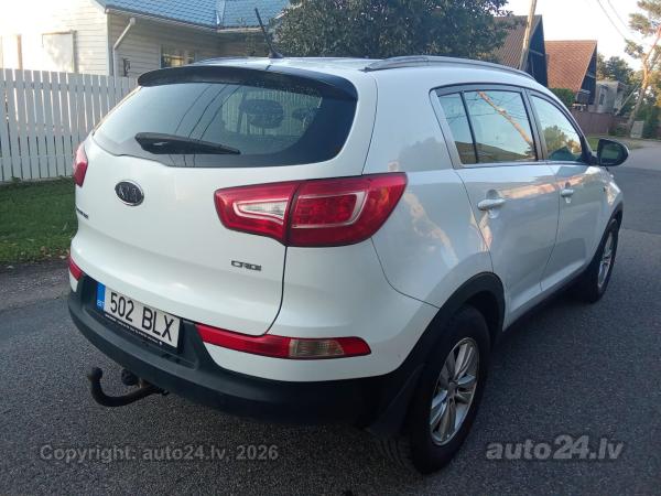 White Kia Sportage 2012 in Saue, with an engine capacity of 1.70 L and mileage of 275 thousand km for 4990 €, photo 5 on AUTOMOTO.COM.LV