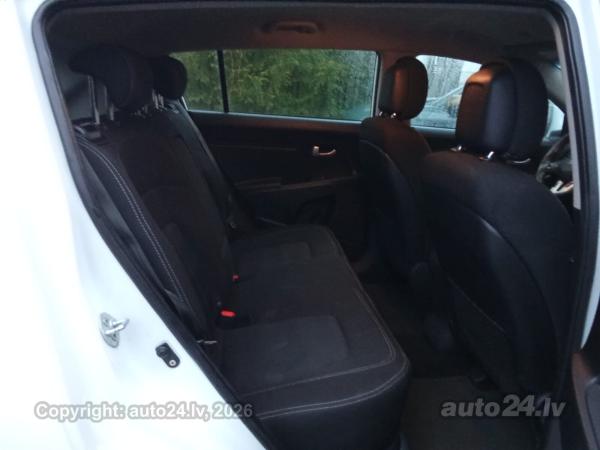 White Kia Sportage 2012 in Saue, with an engine capacity of 1.70 L and mileage of 275 thousand km for 4990 €, photo 11 on AUTOMOTO.COM.LV
