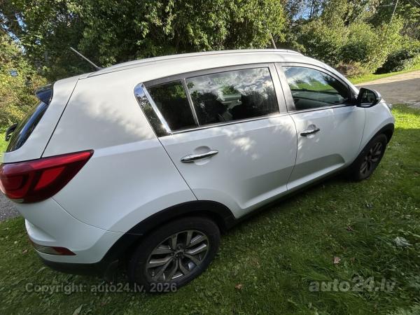 White Kia Sportage 2014 in Turi, with an engine capacity of 2.00 L and mileage of 145 thousand km for 8800 €, photo 11 on AUTOMOTO.COM.LV
