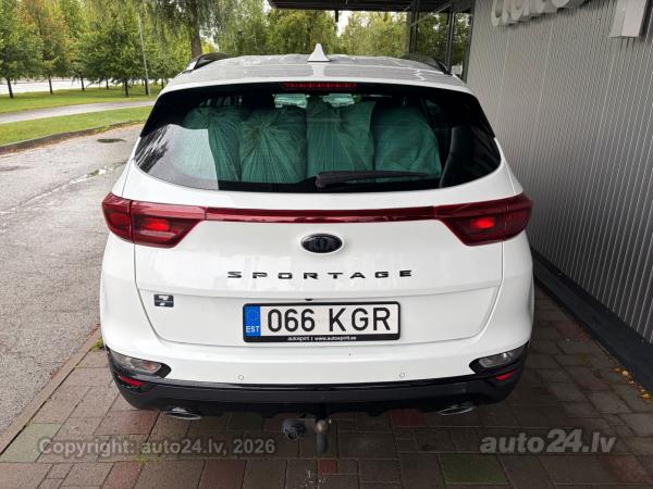 White Kia Sportage 2021 in Tallinn, with an engine capacity of 1.60 L and mileage of 85 thousand km for 17490 €, photo 6 on AUTOMOTO.COM.LV
