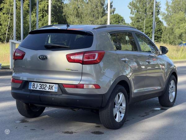 Dzeltens Kia Sportage 2011 Tauragė, ar dzinēja tilpumu 1.69 L un nobraukumu 250 tūkst. km par 4900 €, foto 4 vietnē AUTOMOTO.COM.LV