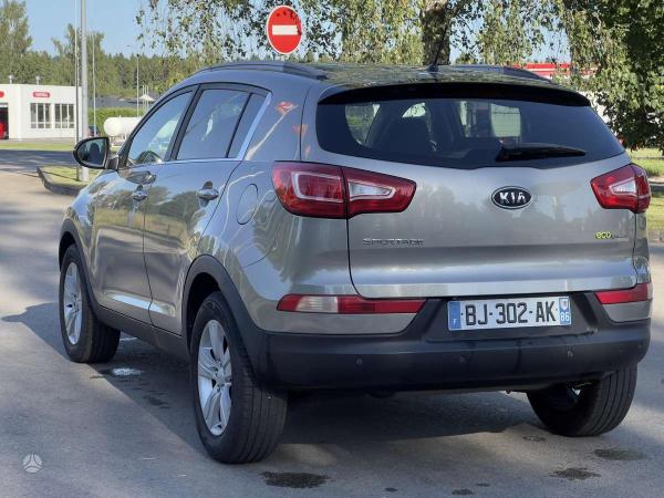 Dzeltens Kia Sportage 2011 Tauragė, ar dzinēja tilpumu 1.69 L un nobraukumu 250 tūkst. km par 4900 €, foto 5 vietnē AUTOMOTO.COM.LV