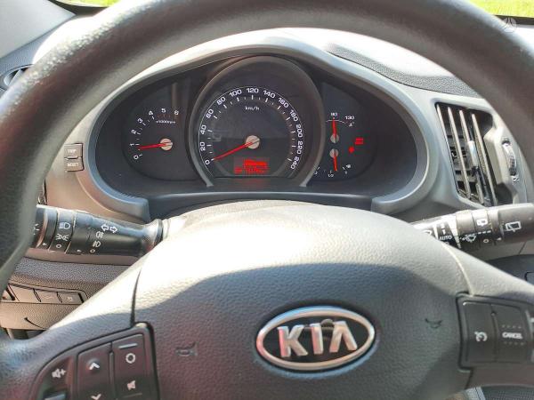 Yellow Kia Sportage 2012 in Prienai, with an engine capacity of 1.69 L and mileage of 169 thousand km for 6400 €, photo 9 on AUTOMOTO.COM.LV