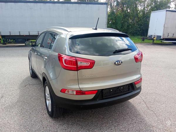 Kia Sportage 2013 in Alytus on AUTOMOTO.COM.LV Yellow Kia Sportage 2013 in Alytus, with an engine capacity of 1.69 L and mileage of 283 thousand km for 7200 €, photo 11 on AUTOMOTO.COM.LV